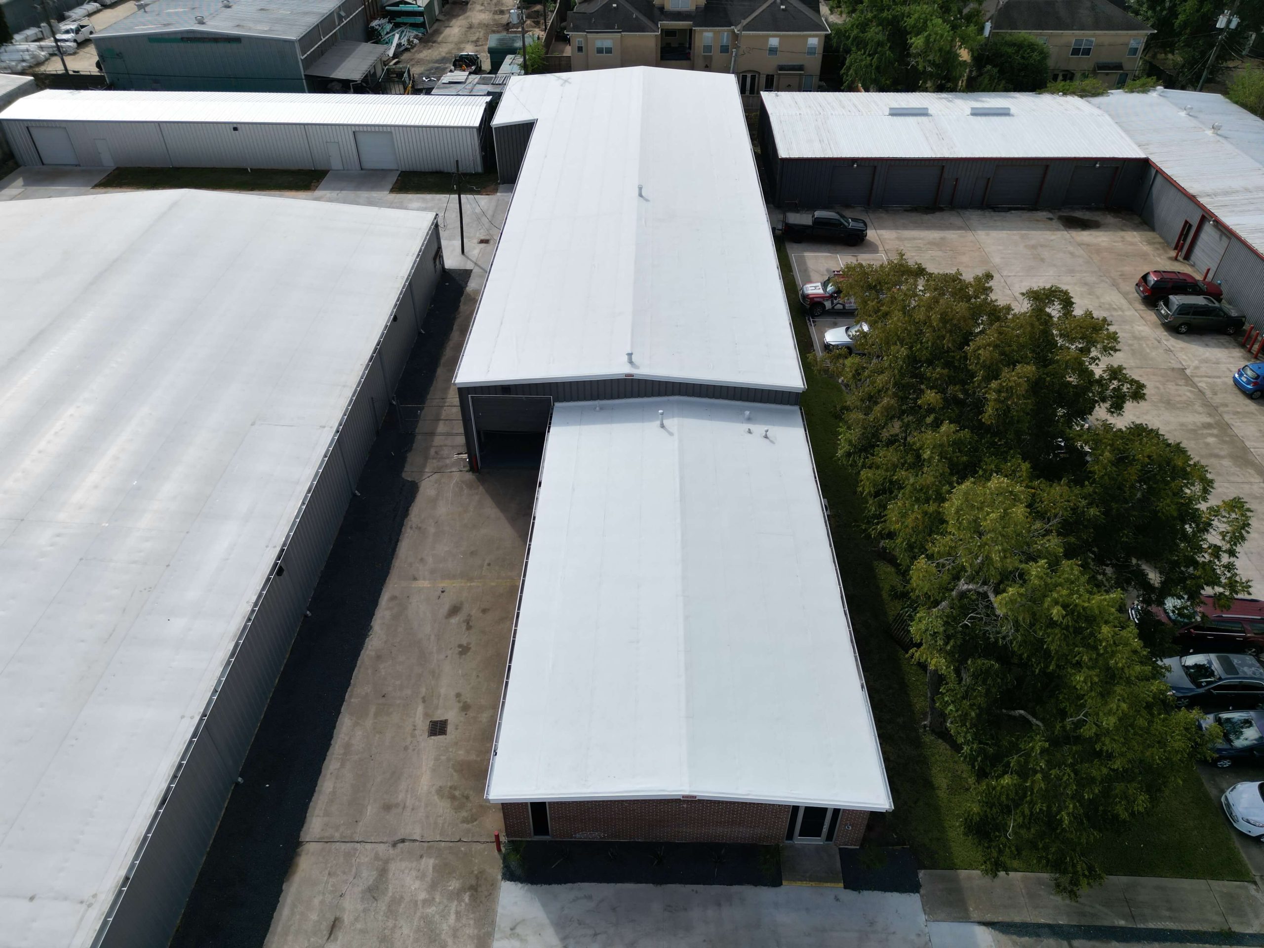 Finished TPO Roof Retrofit Over Metal Panels – HHH Roofing & Construction