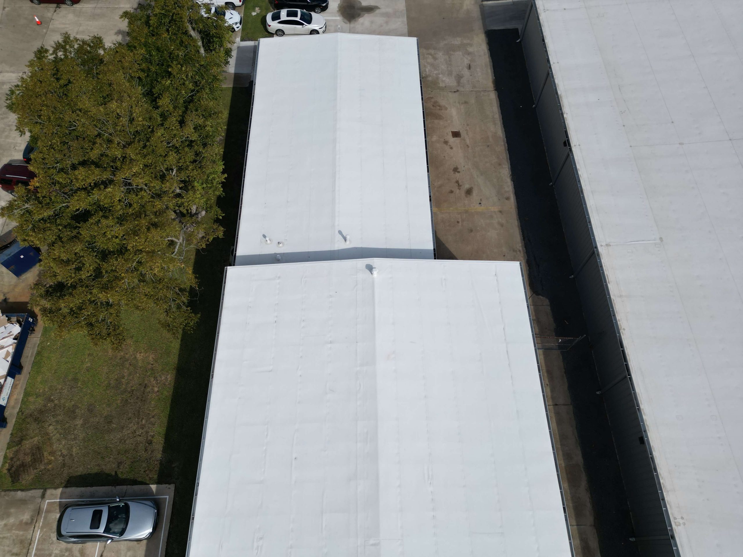 Finished TPO Roof Retrofit Over Metal Panels – HHH Roofing & Construction