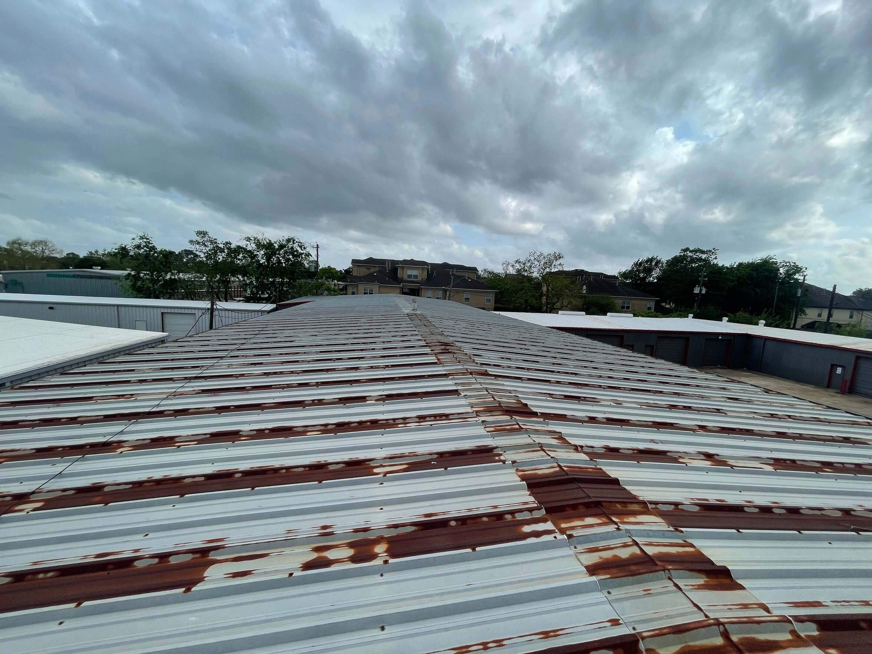 TPO Metal Retrofit Roof Installation Houston – HHH Roofing & Construction