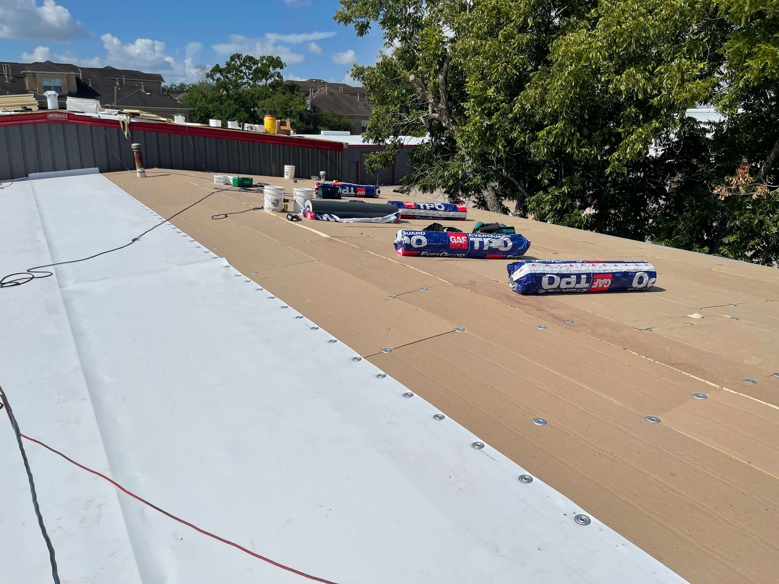 TPO Metal Retrofit Roof Installation Houston – HHH Roofing & Construction