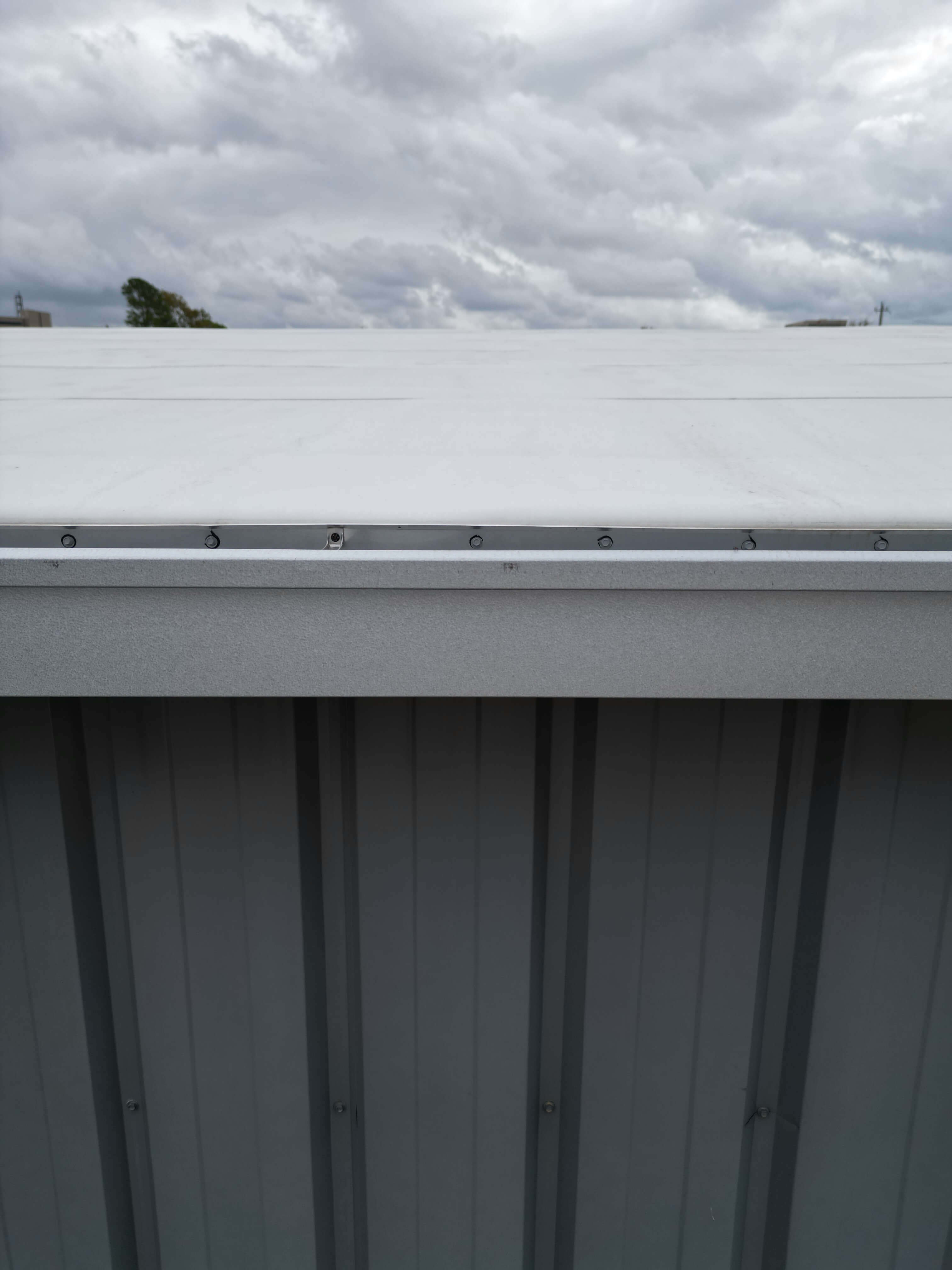 TPO Metal Retrofit Roof Installation Houston – HHH Roofing & Construction