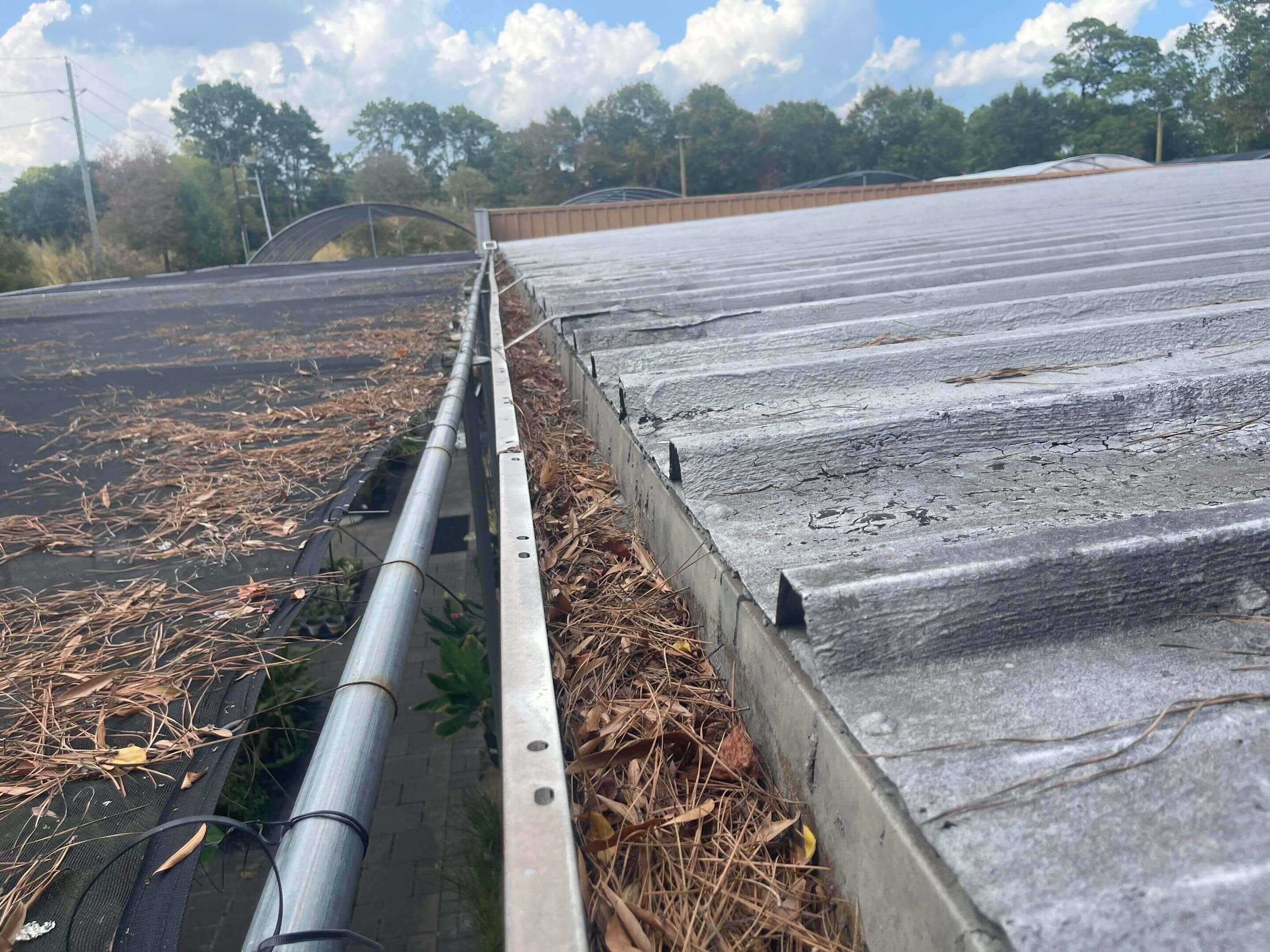 TPO Metal Retrofit Roof Installation – HHH Roofing & Construction